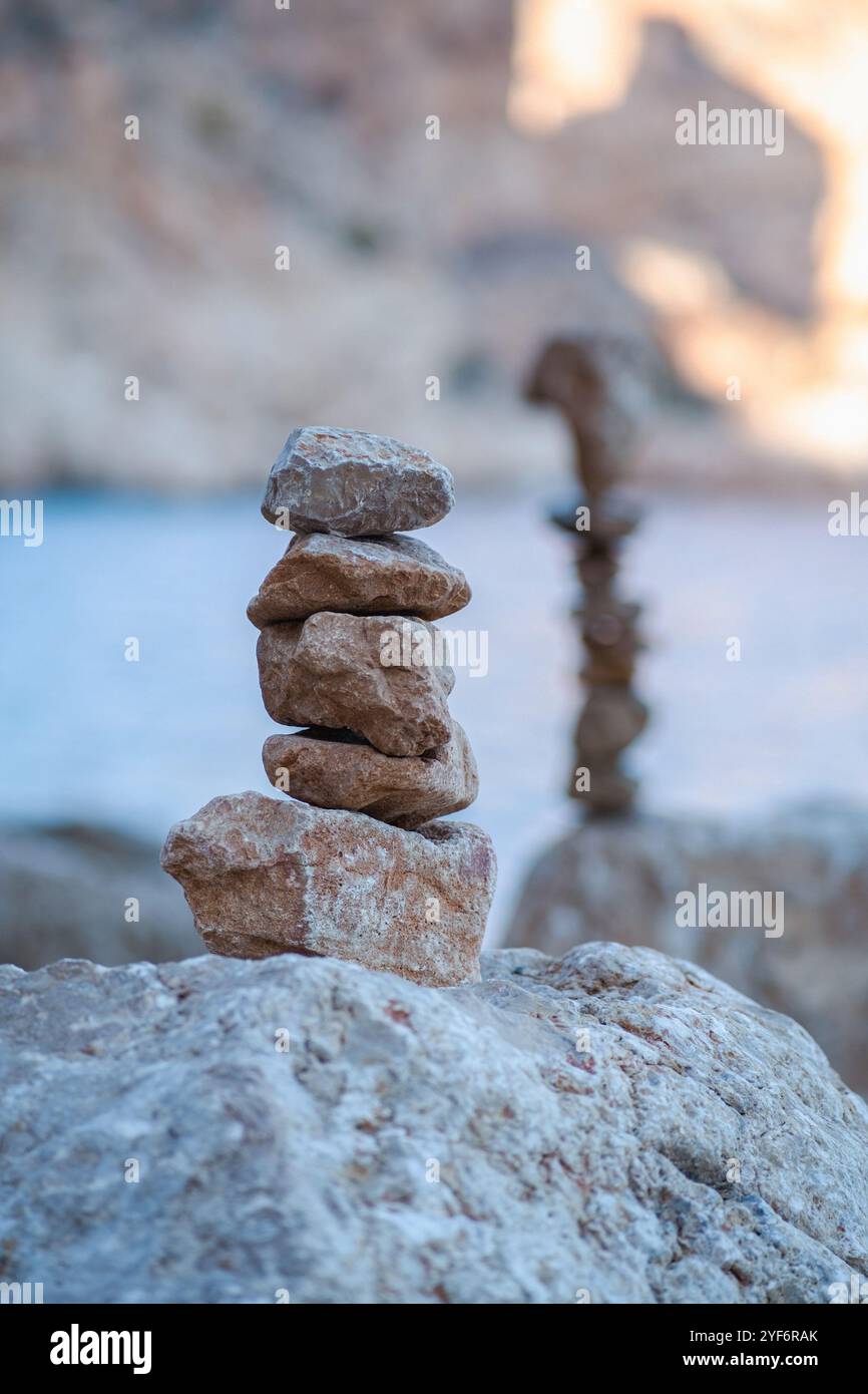 Stone pyramids on the beach Stock Photo - Alamy