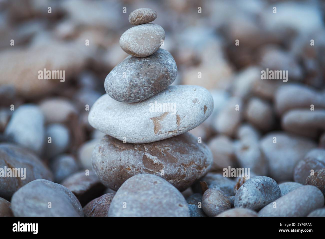 Stone pyramids on the beach Stock Photo - Alamy