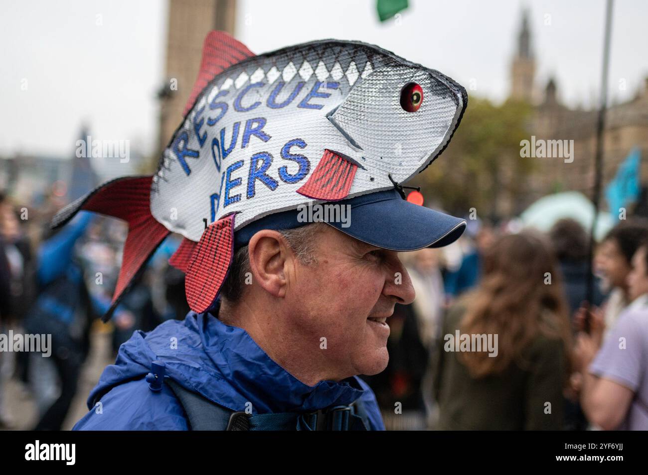 London, UK. 03rd Nov, 2024. A demonstrator is seen wearing a fish ...