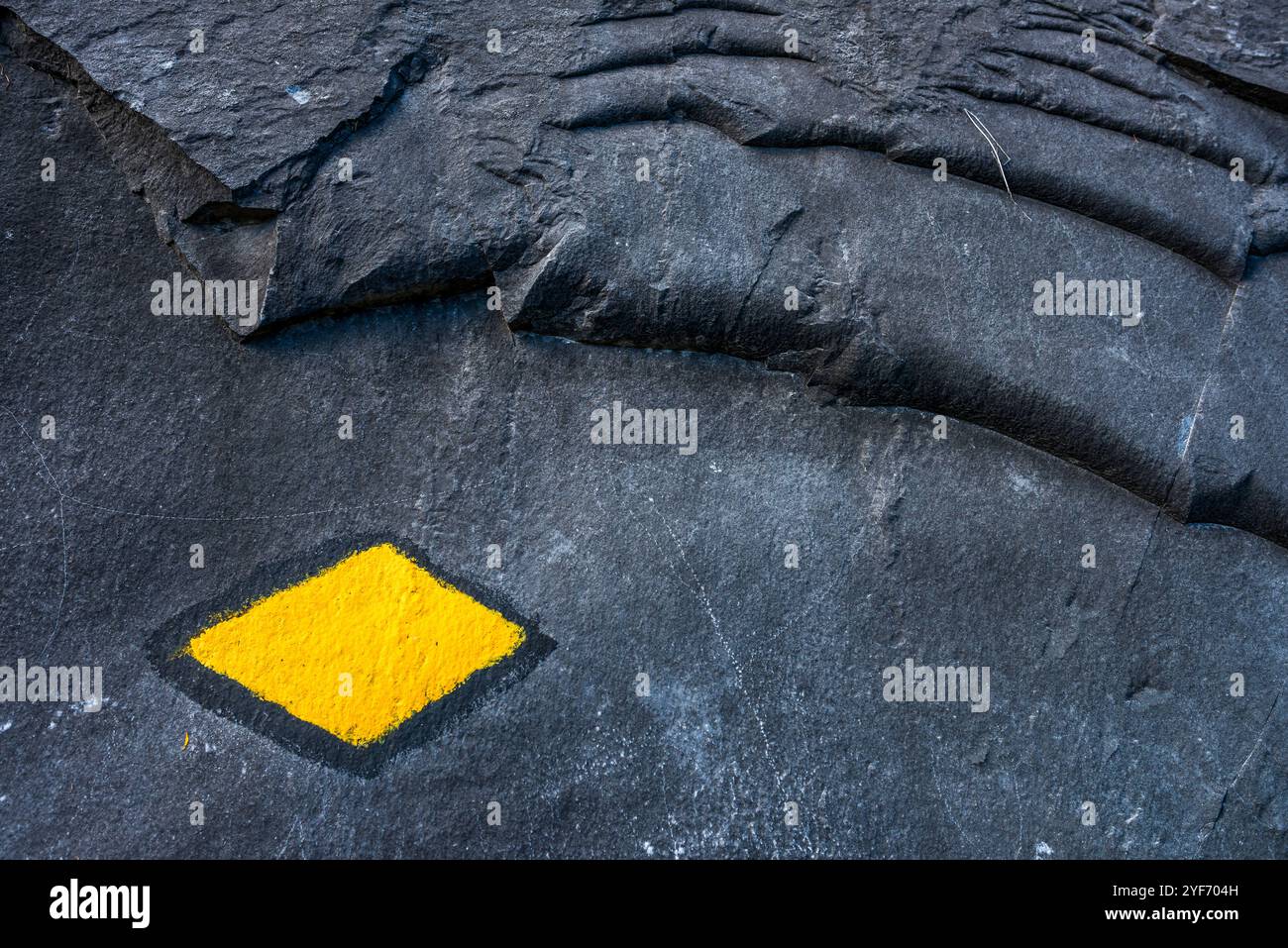 Yellow Hiking Trail Marker on a Rock, Pedestrian Tourism in Switzerland ...