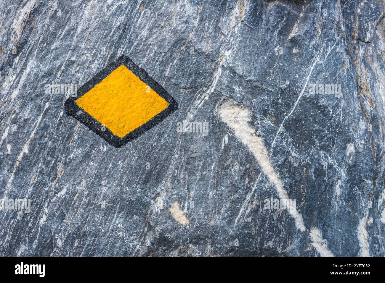 Yellow Hiking Trail Marker on a Rock, Pedestrian Tourism in Switzerland ...