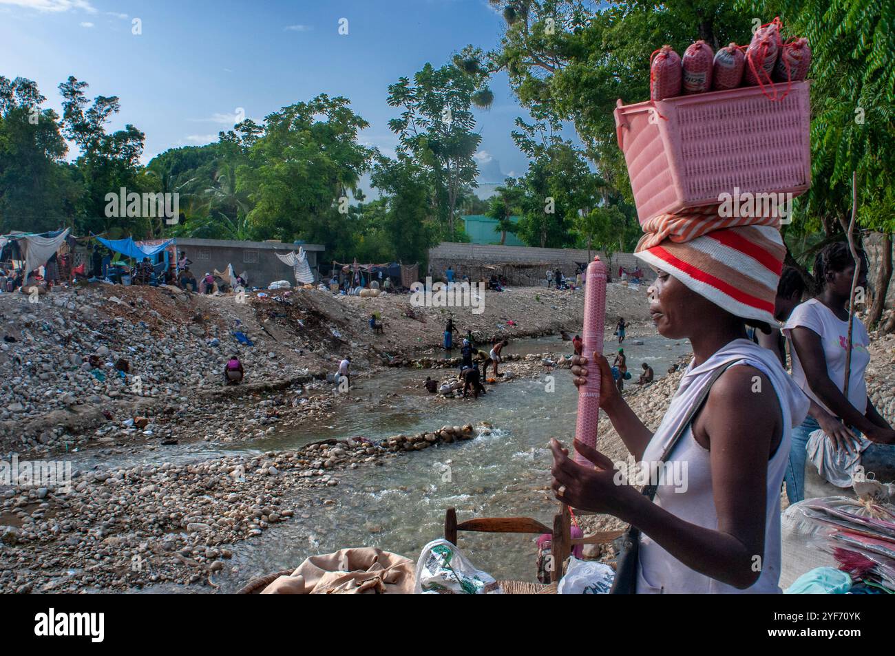 Garbage and street sellers on banks of Riviere de la Cosse, Jacmel ...