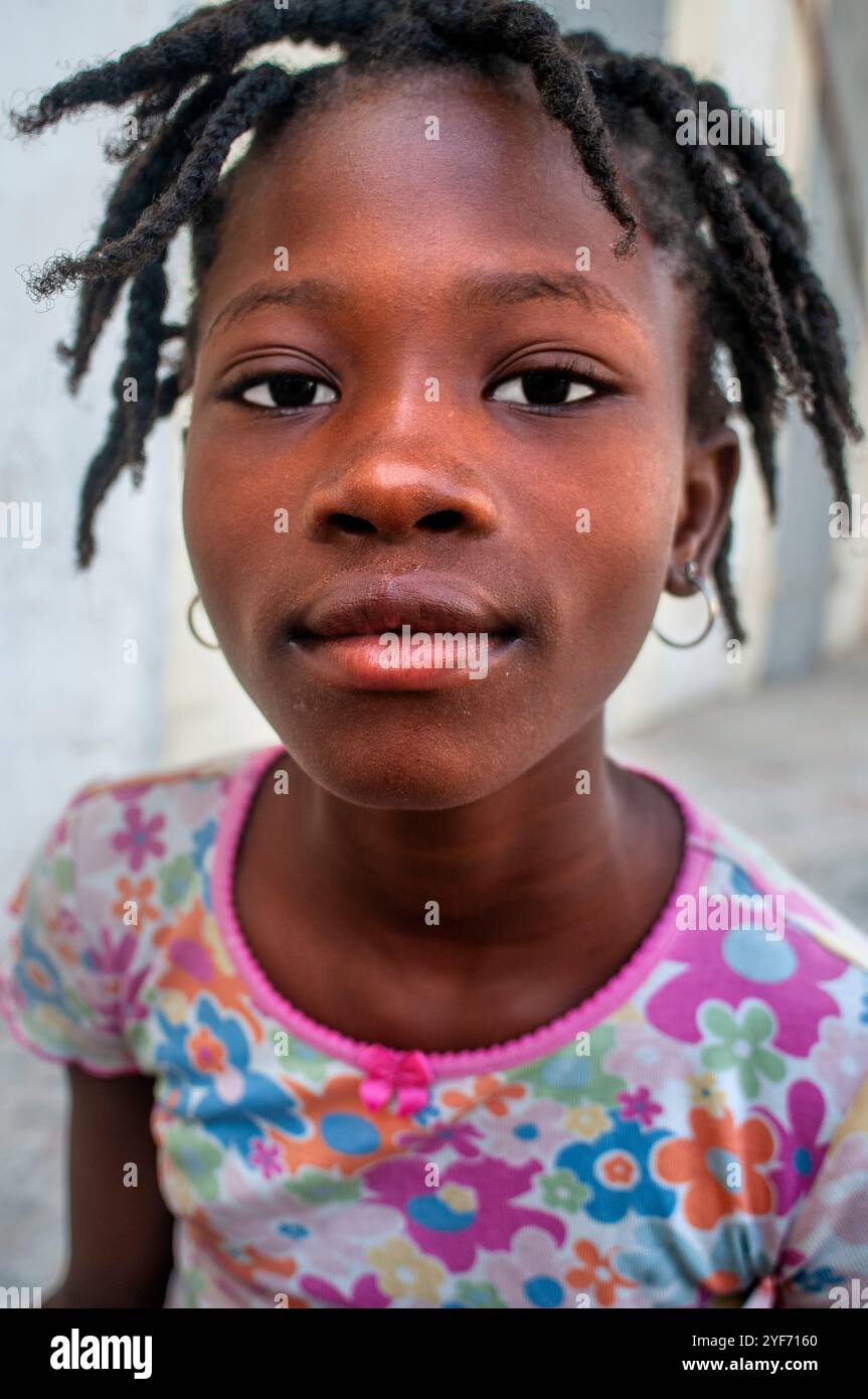 Portrait of a haitian nice girl in the historic colonial old town ...