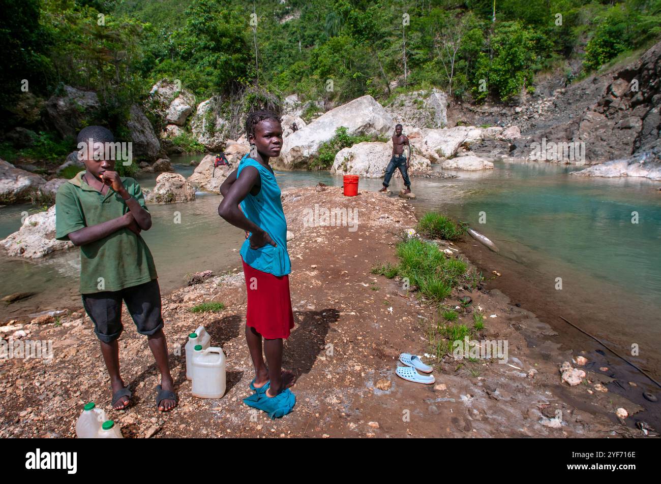 Exploring the cobalt waters of Bassin Bleu waterfall composed of bassin ...