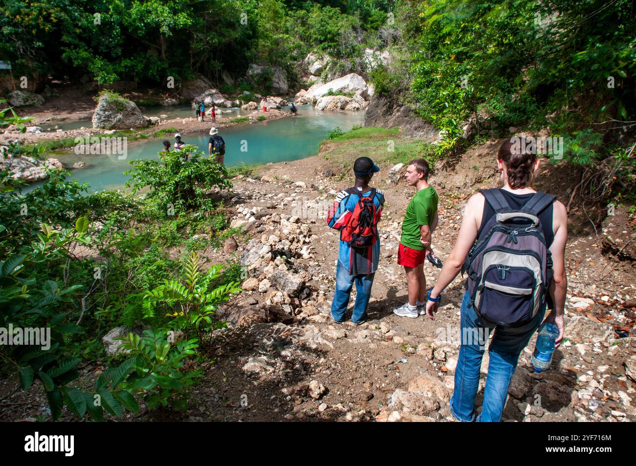 Exploring the cobalt waters of Bassin Bleu waterfall composed of bassin ...