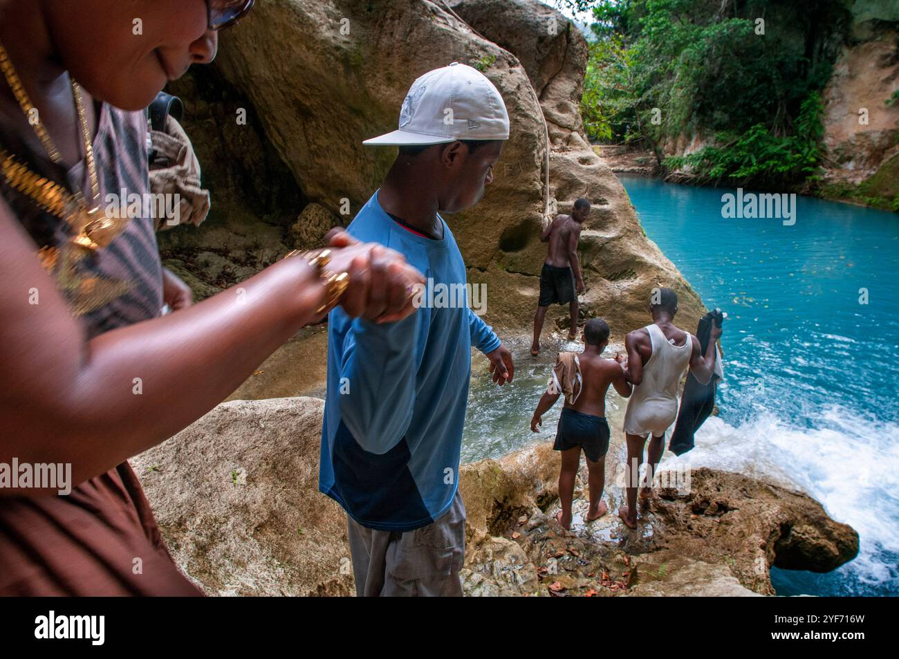 Exploring the cobalt waters of Bassin Bleu waterfall composed of bassin ...