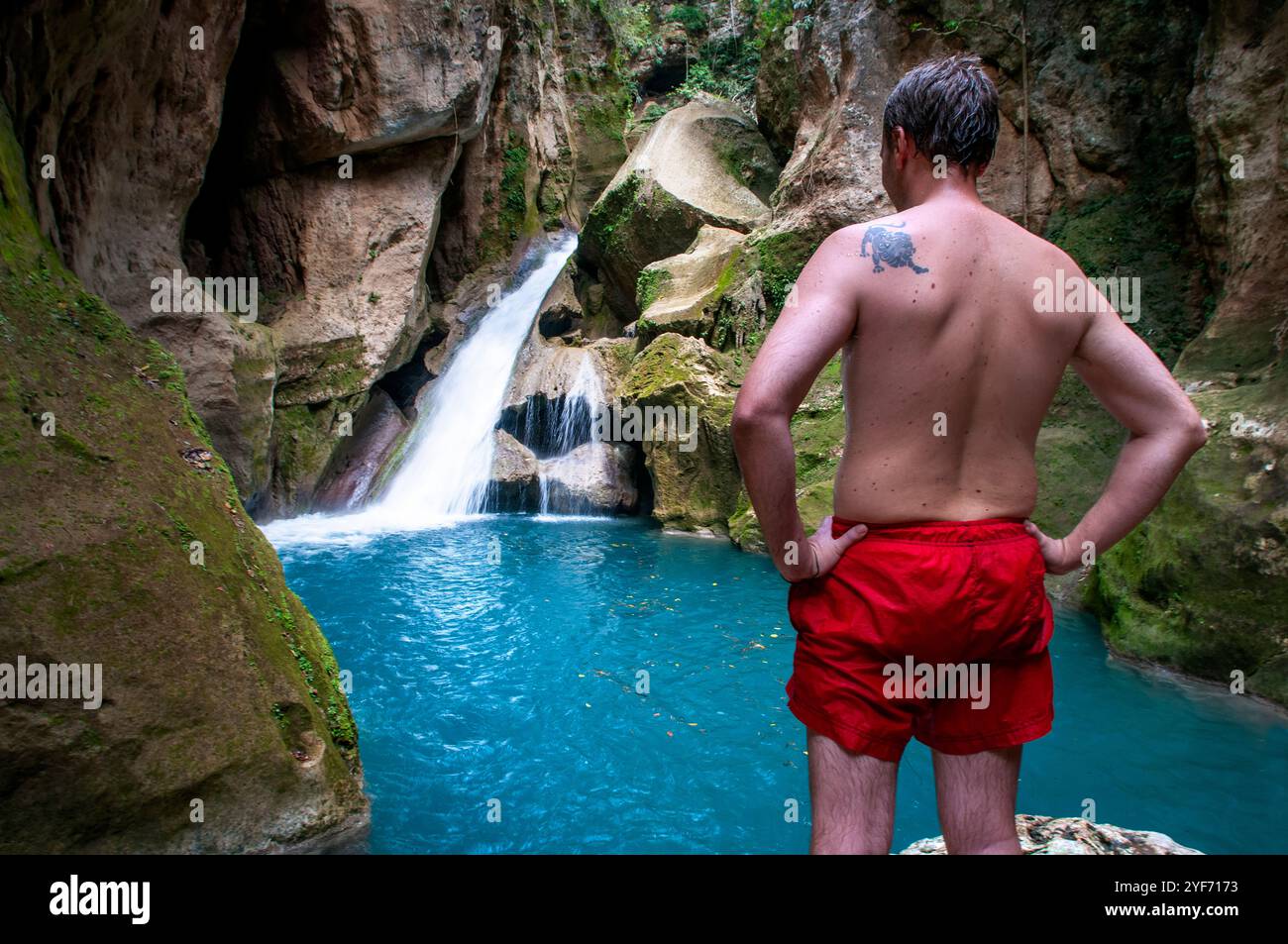 Exploring the cobalt waters of Bassin Bleu waterfall composed of bassin ...