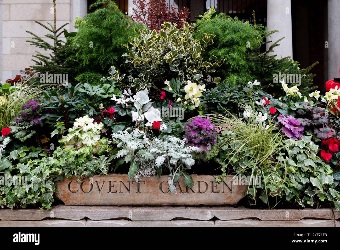 Floral display marking an entrance to the famed Covent Garden, an ...