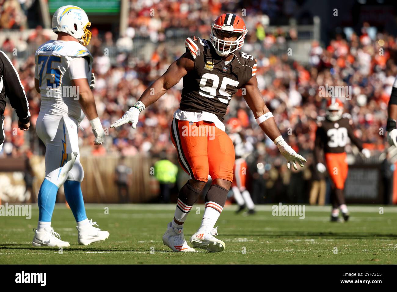 Cleveland Browns defensive end Myles Garrett (95) reacts after sacking ...