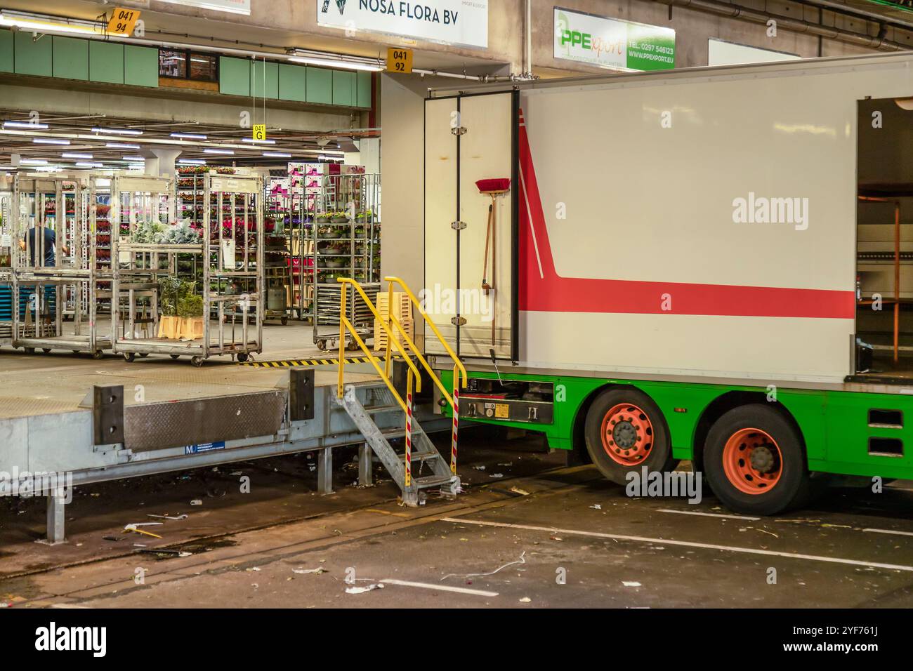 Roll containers with flowers from the Aalsmeer flower auction are ...