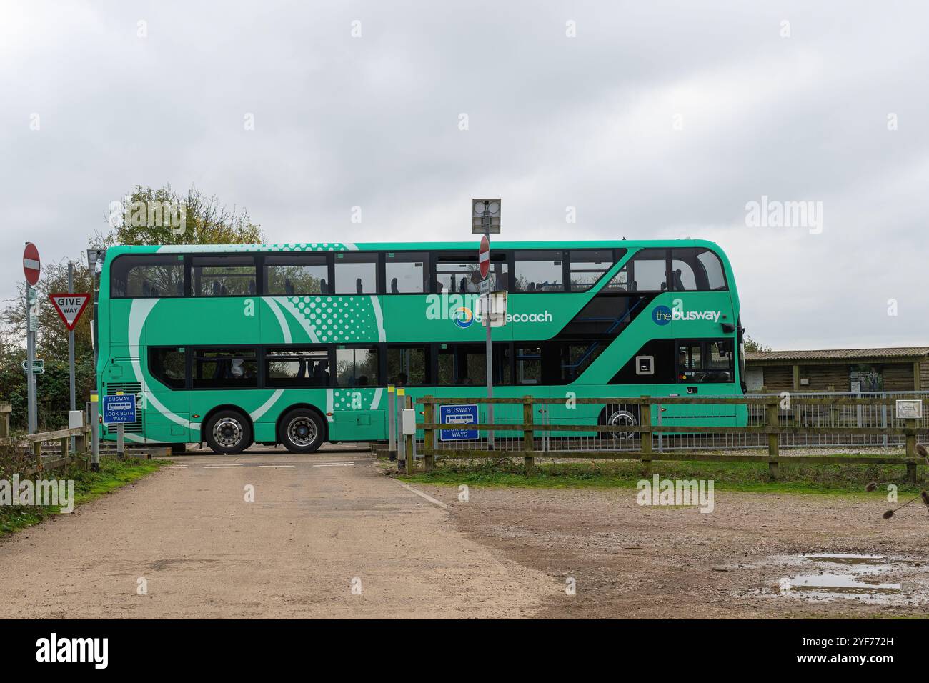 A Stagecoach bus travelling on the Cambridgeshire Guided Busway passing ...