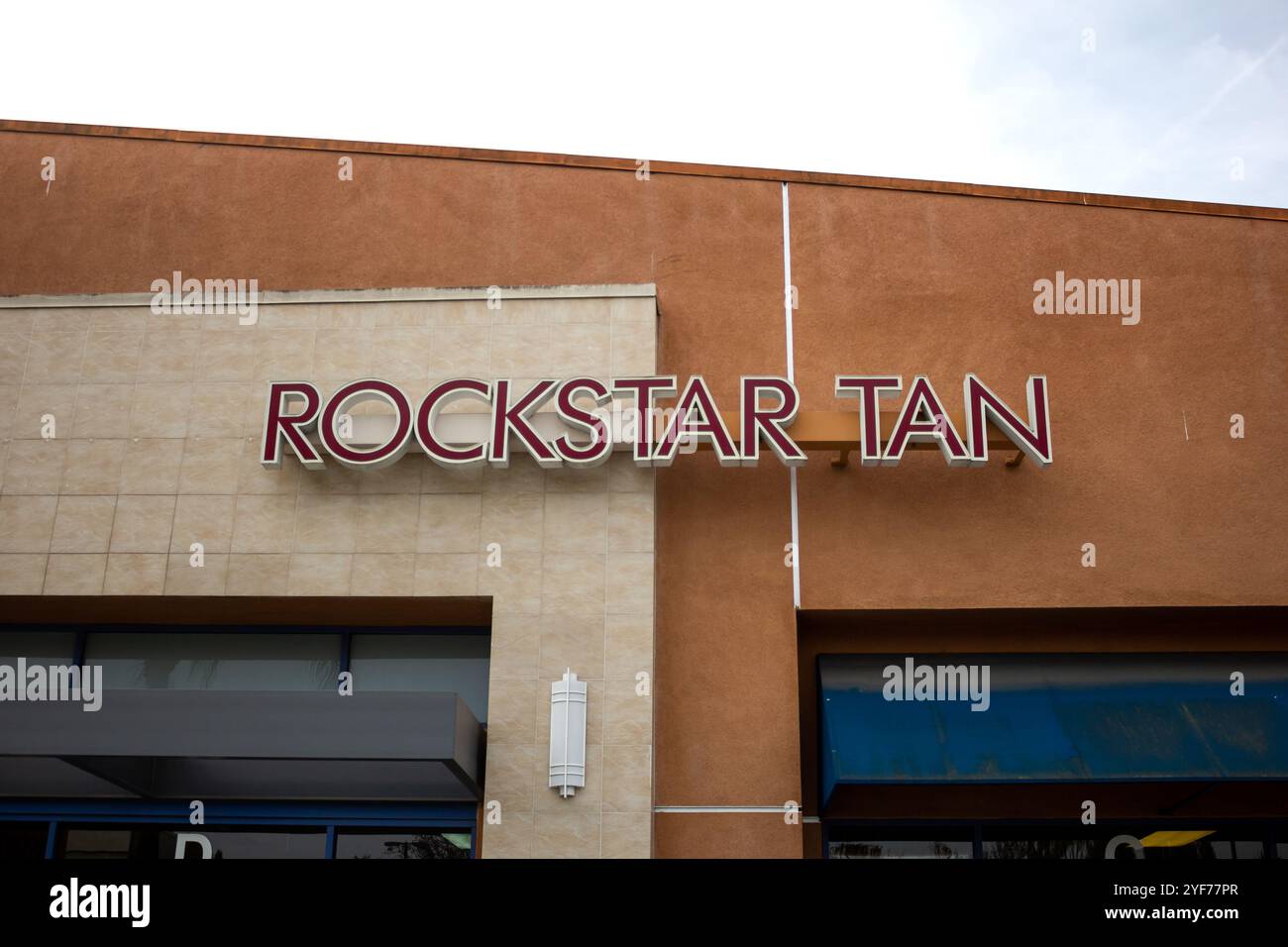 A store front sign for the tanning salon known as Palm Beach Tan Stock ...