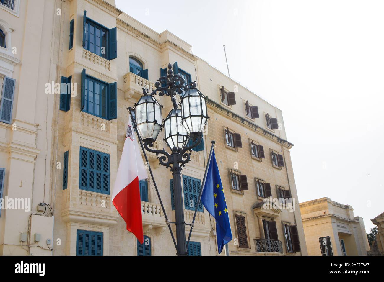 Flags of Malta and European Union in the city center of Valletta Stock ...