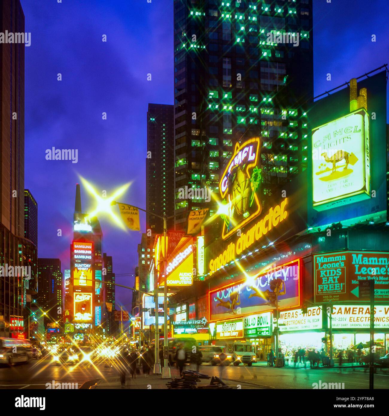 New York 1990s, Times square at dusk, illuminated advertising signs ...