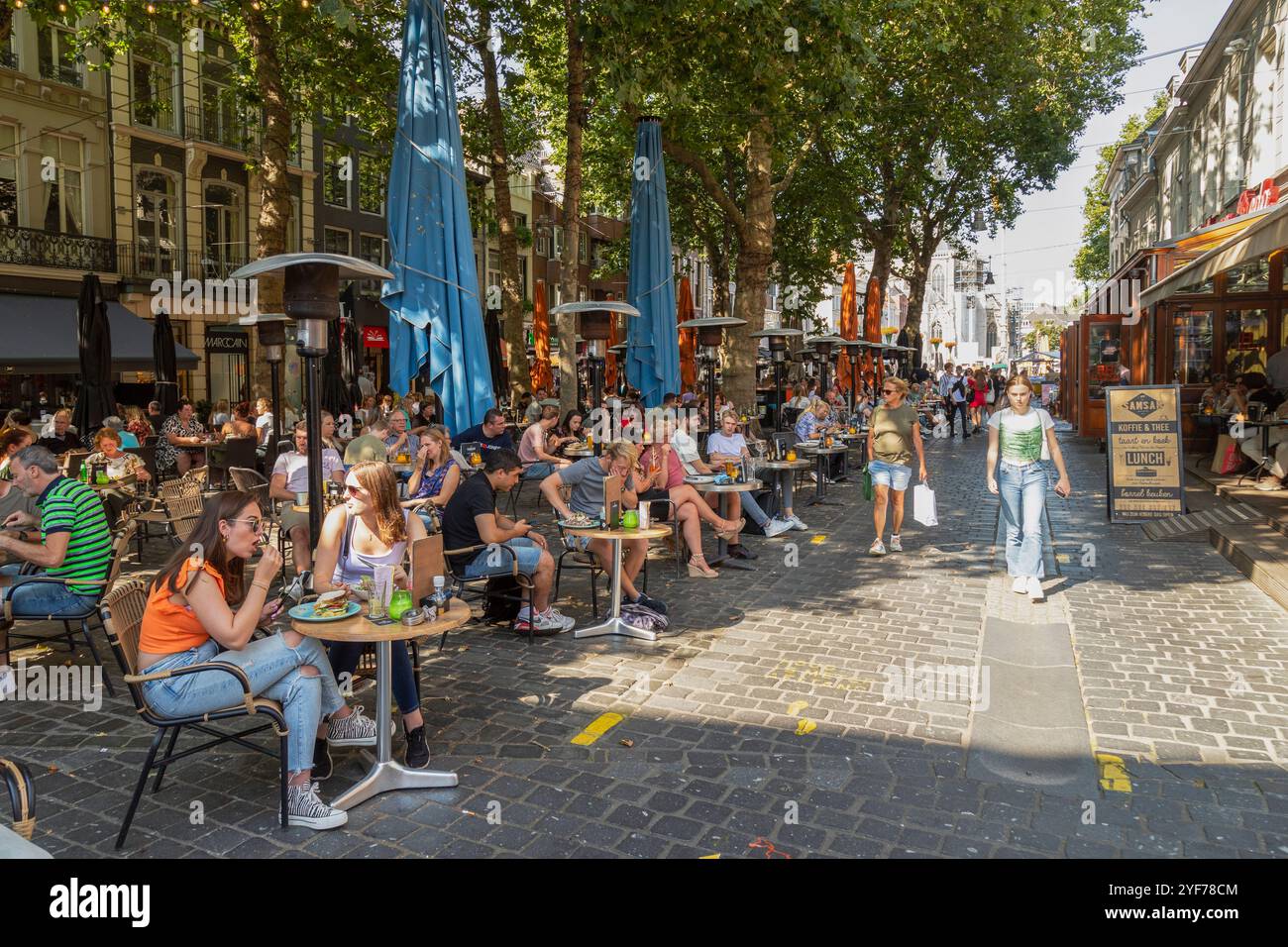 Street full of cozy terraces in the center of the Dutch city of Breda ...