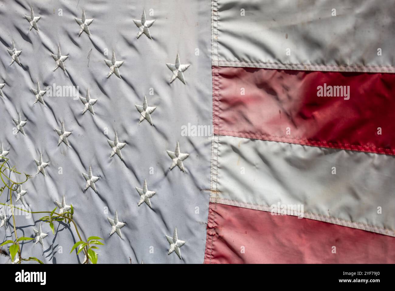 A view of the faded colors of a retired flag of the United States Stock ...