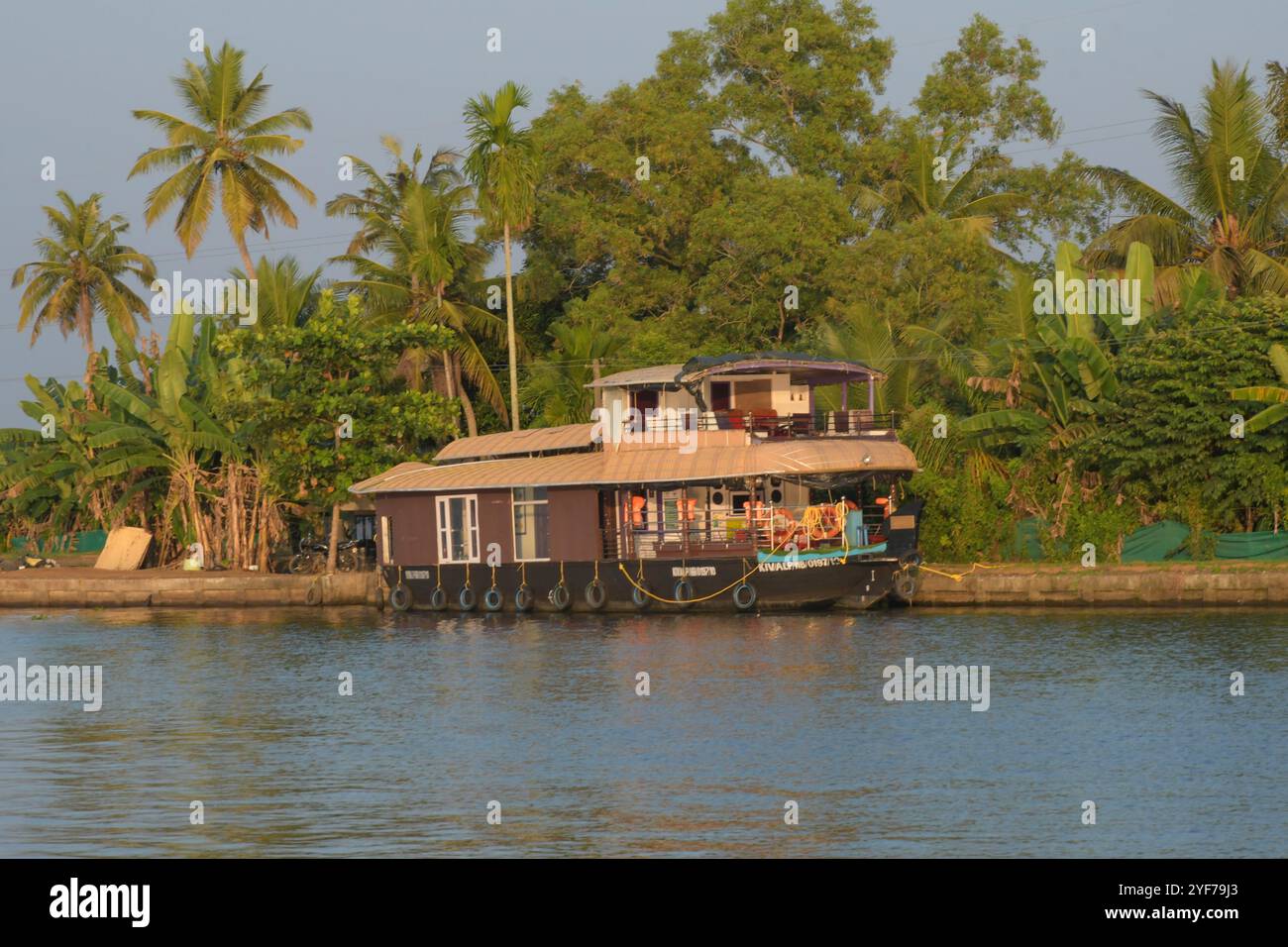 Houseboat in Kerala backwater sailing through the canals in Alappuzha India Stock Photo - Alamy
