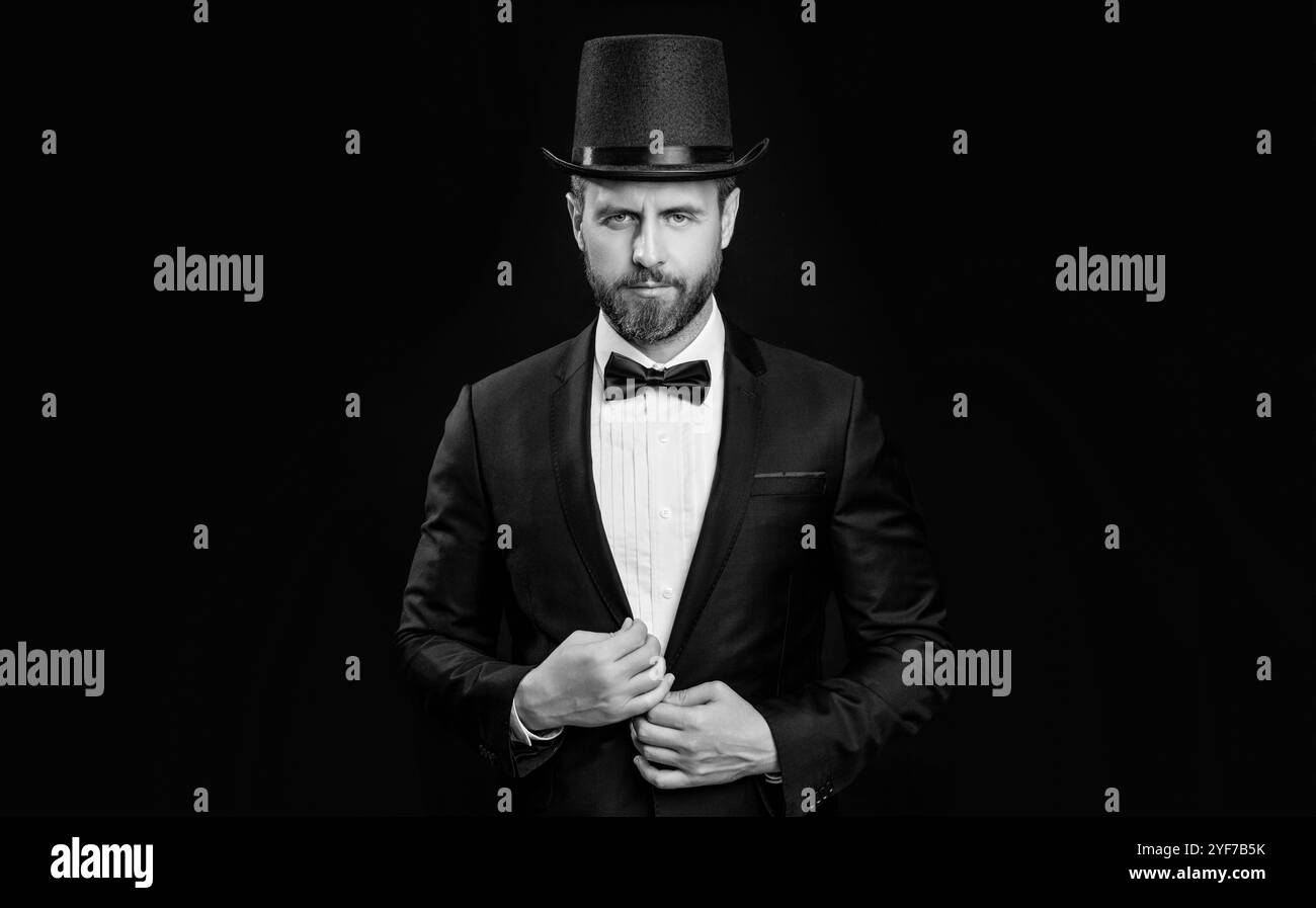 tuxedo showman isolated on black background. tuxedo showman in studio ...