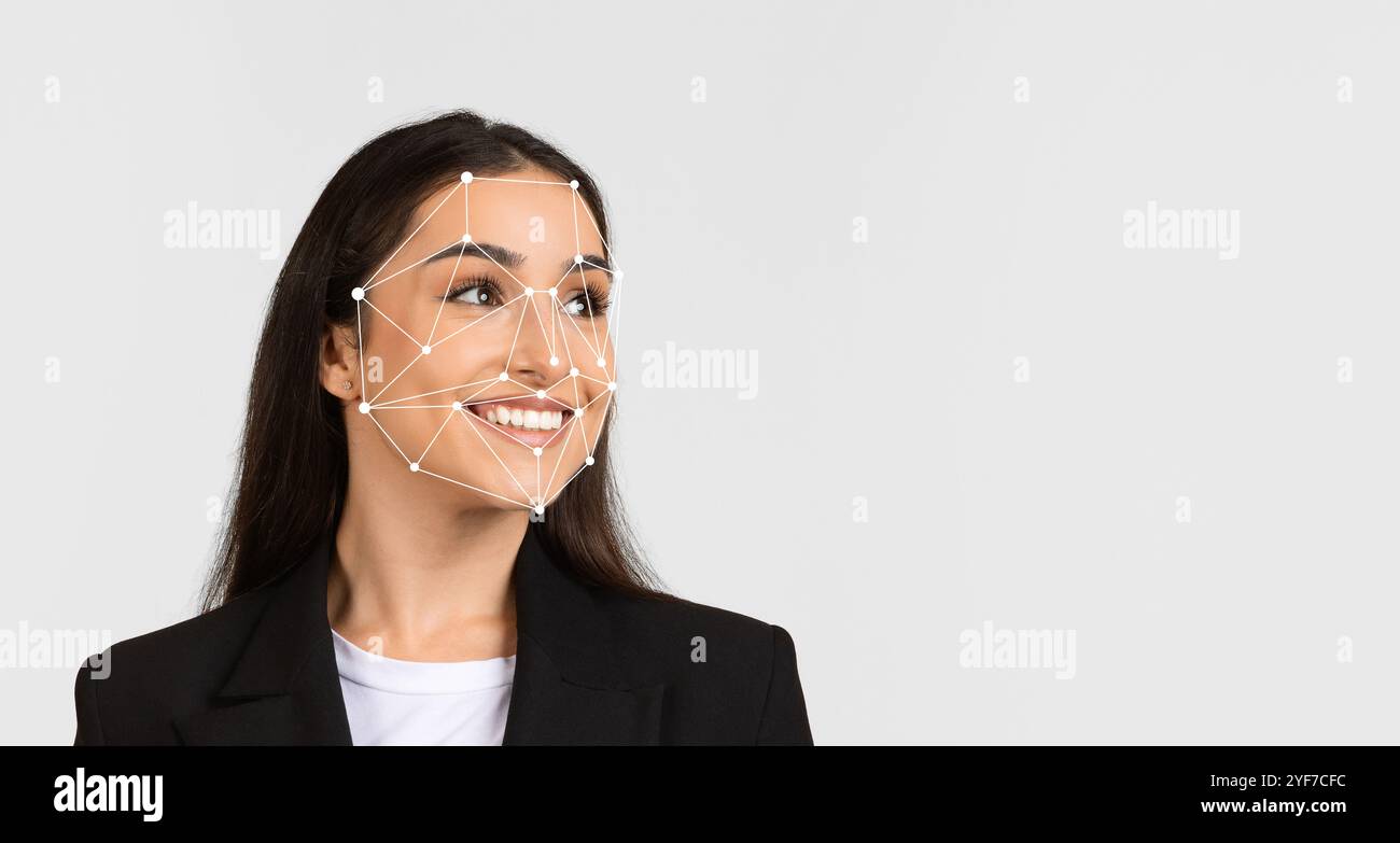 Smiling woman with facial recognition markers, showing tech use Stock ...