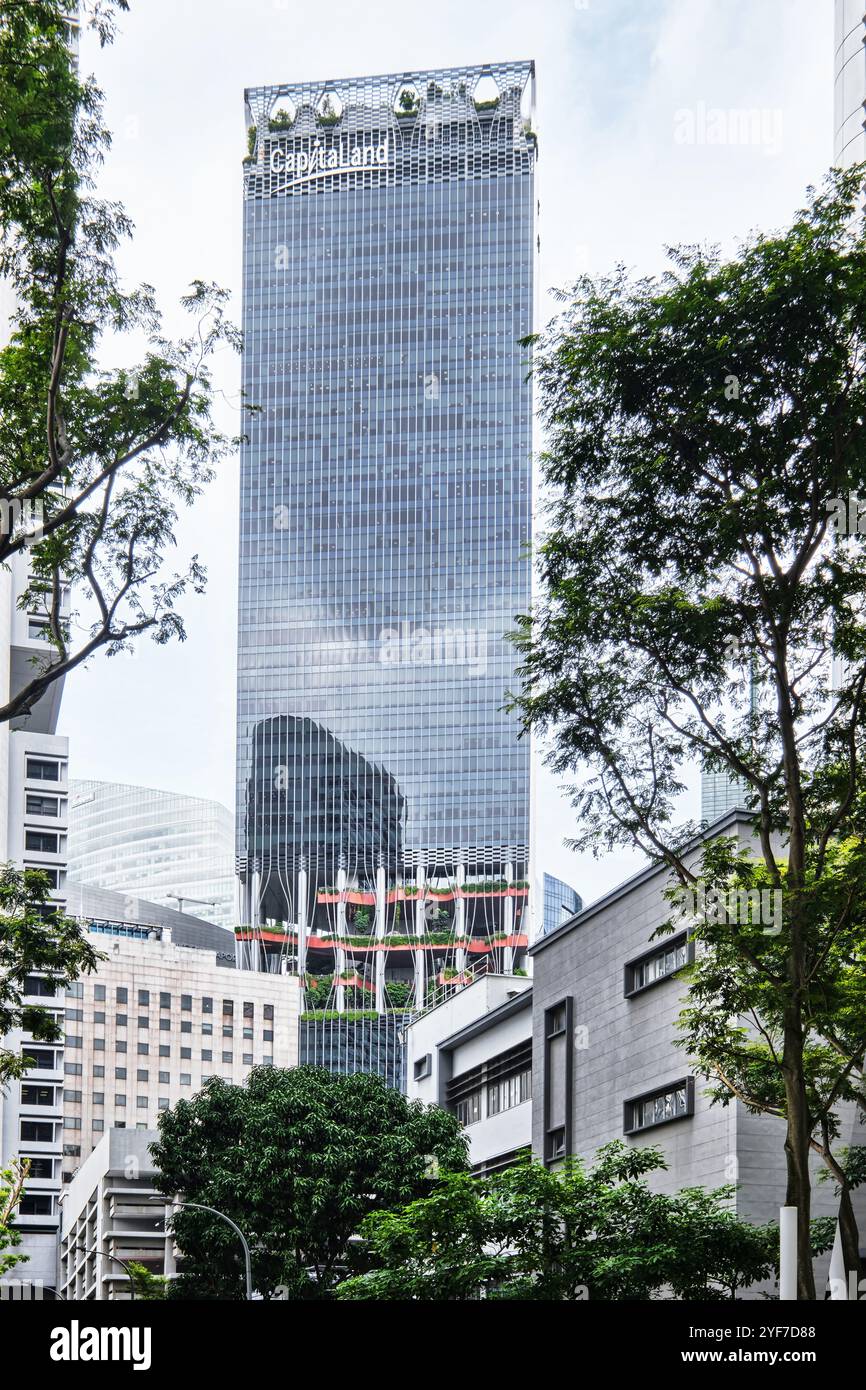Singapore - August 12, 2024: CapitaSpring skyscraper with unique ...