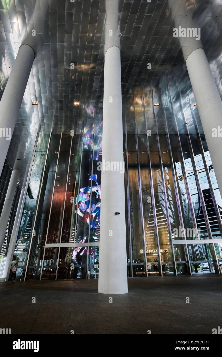Singapore - August 12, 2024: CapitaSpring skyscraper entrance with high ...