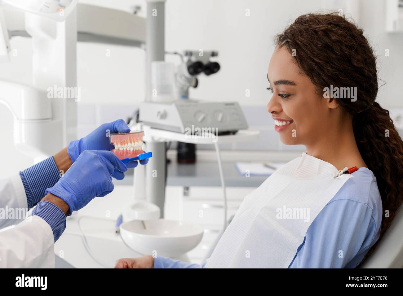 Female dentist showing dental instruments hi-res stock photography and ...