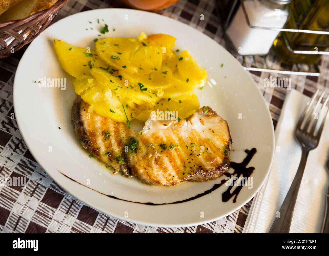 Roasted shark steak with salsa verde Stock Photo - Alamy