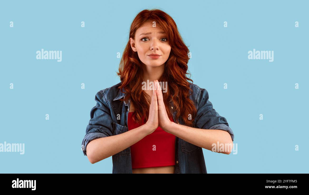Millennial Girl Keeping Hands In Praying Gesture, Panorama, Studio Shot ...