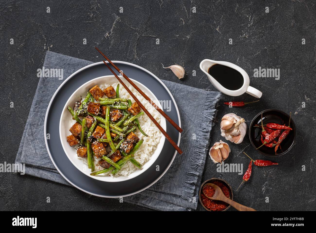 garlic green bean stir fry with crispy tofu served with jasmine rice in ...