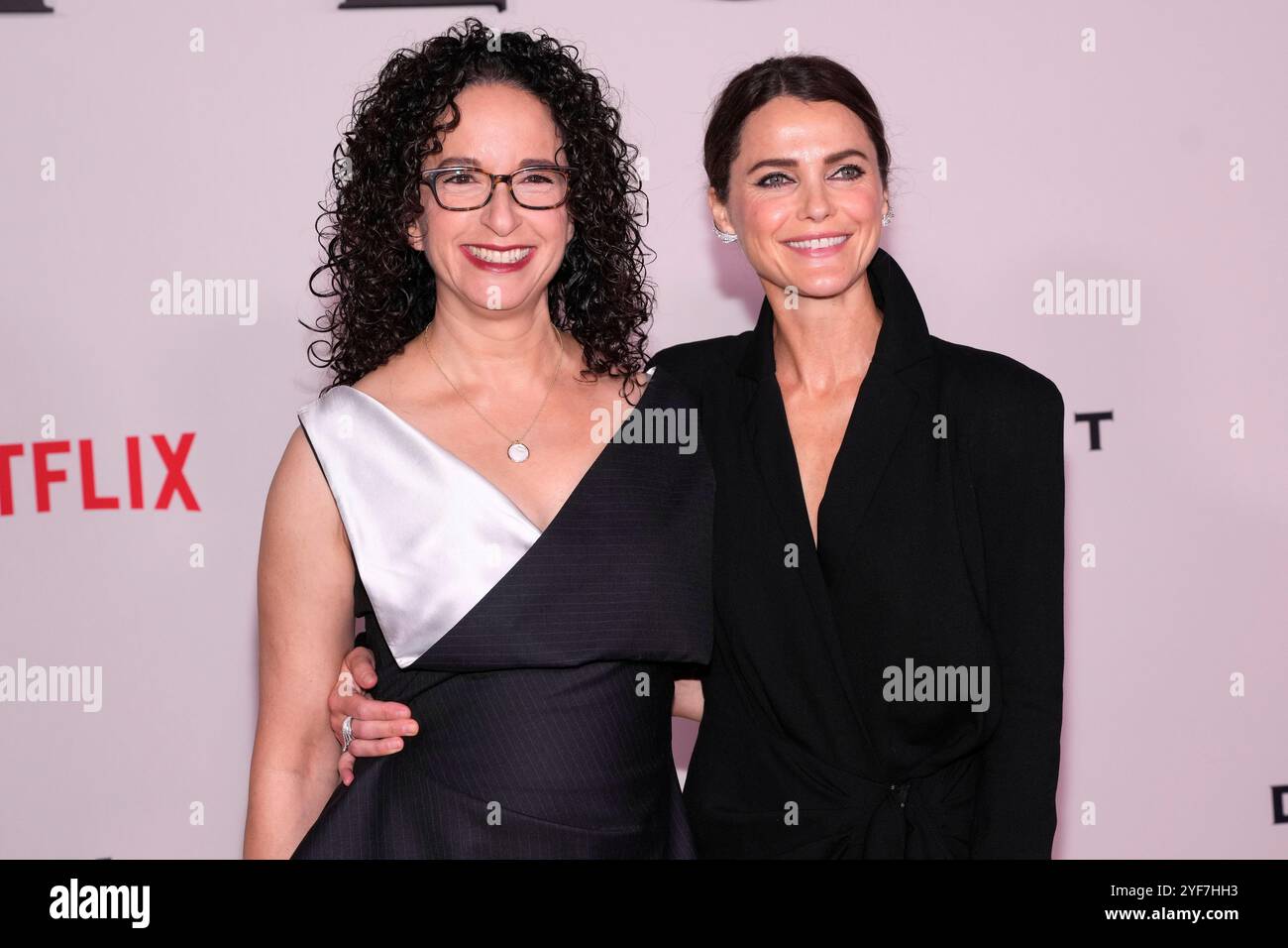 Debora Cahn, left and Keri Russell attend the premiere of Netflix's ...