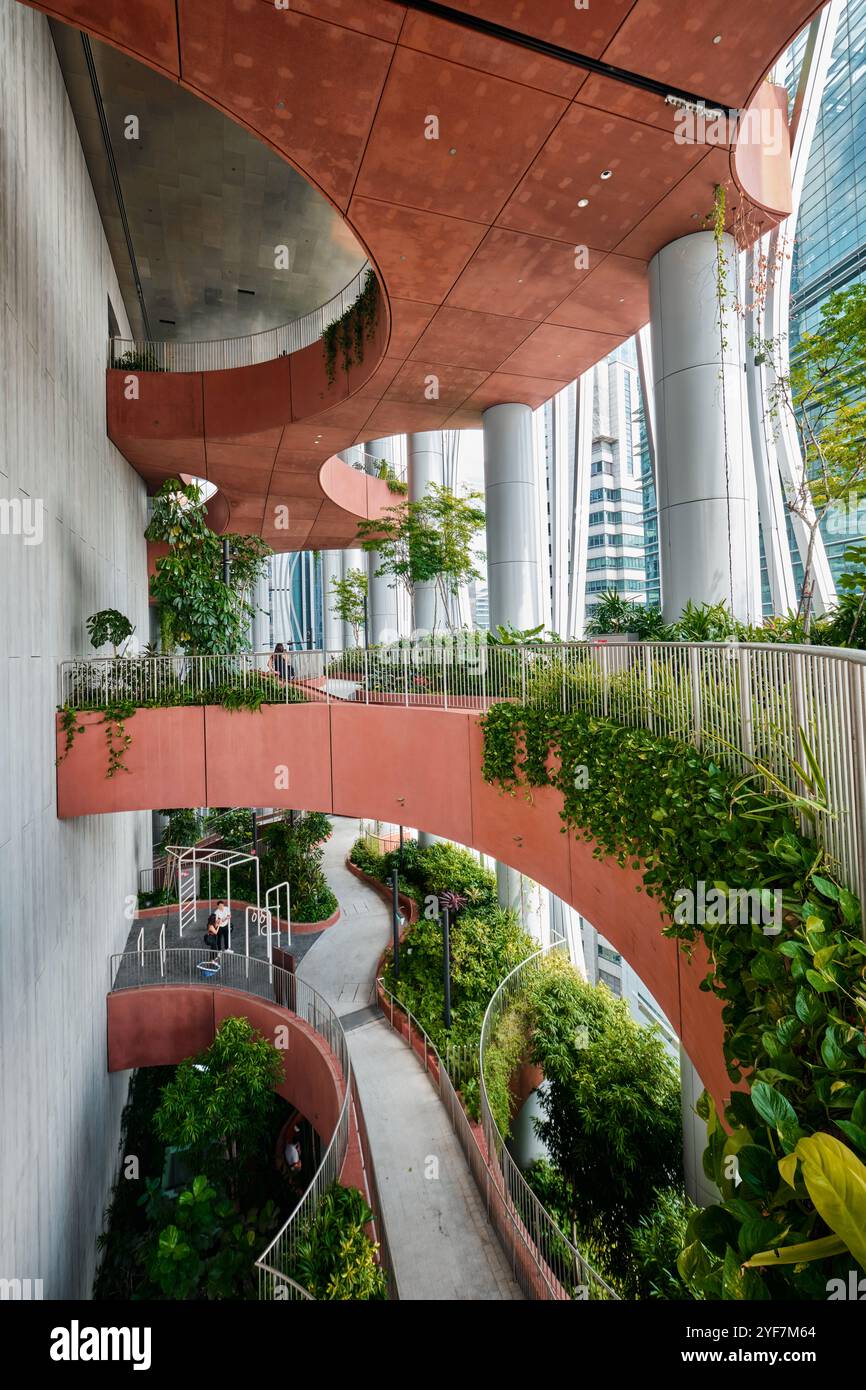 Singapore - August 16, 2024: CapitaSpring skyscraper with walkways and ...