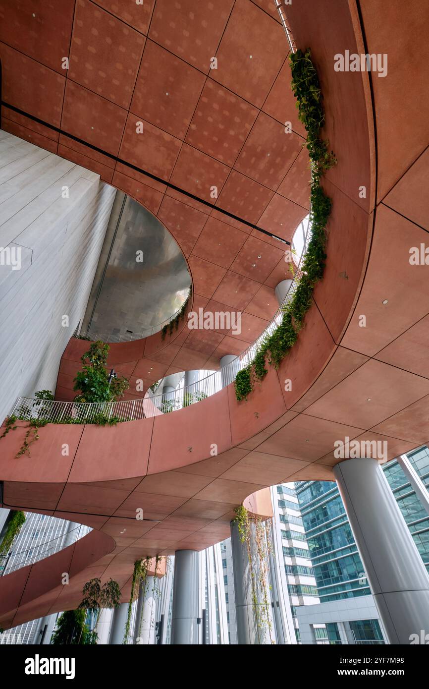 Singapore - August 16, 2024: CapitaSpring skyscraper with walkways and ...