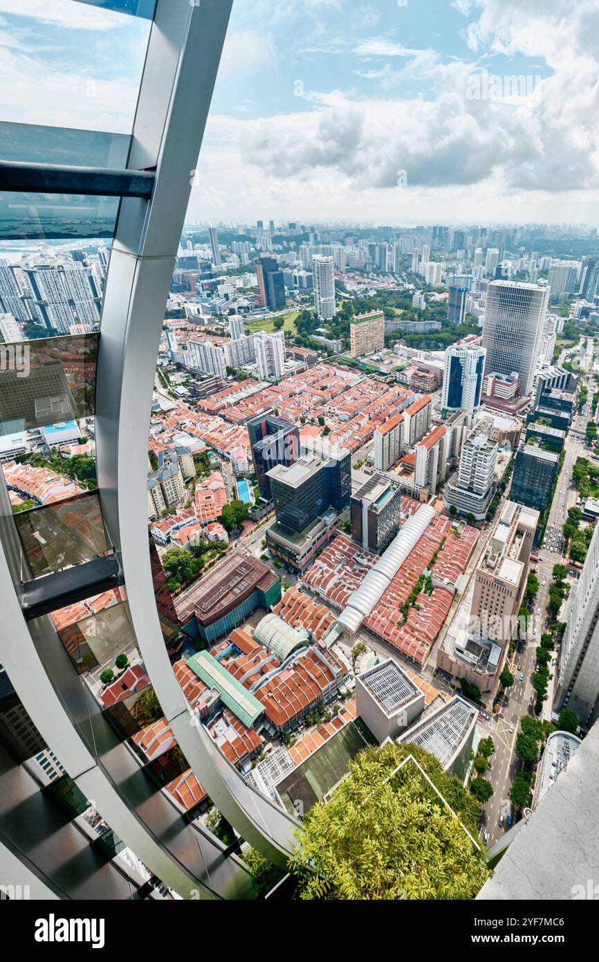 Singapore - August 16, 2024: CapitaSpring skyscraper with walkways and ...