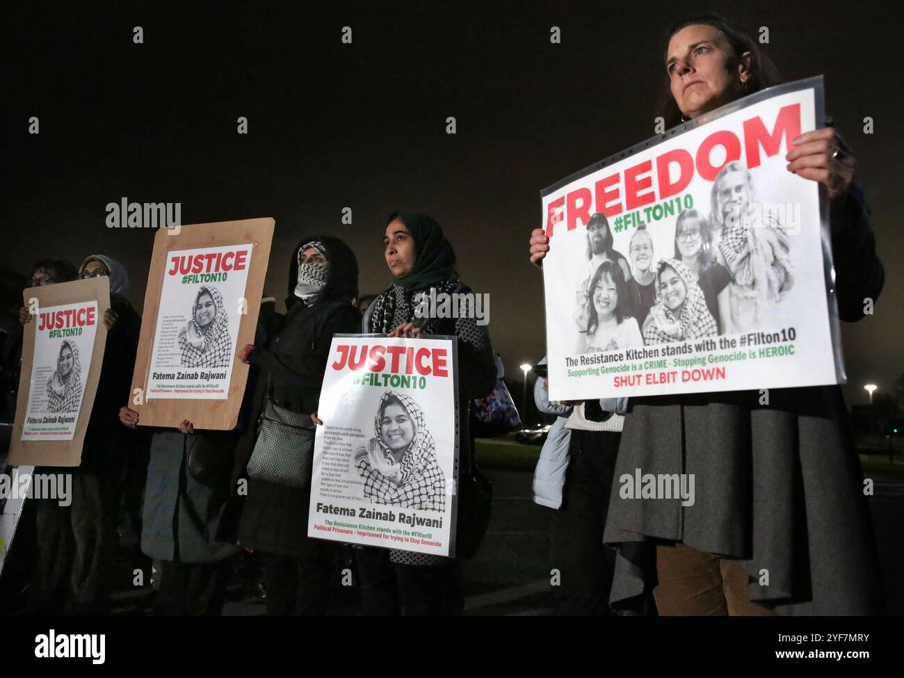 Reigate, England, UK. 2nd Nov, 2024. Protesters stand outside the ...