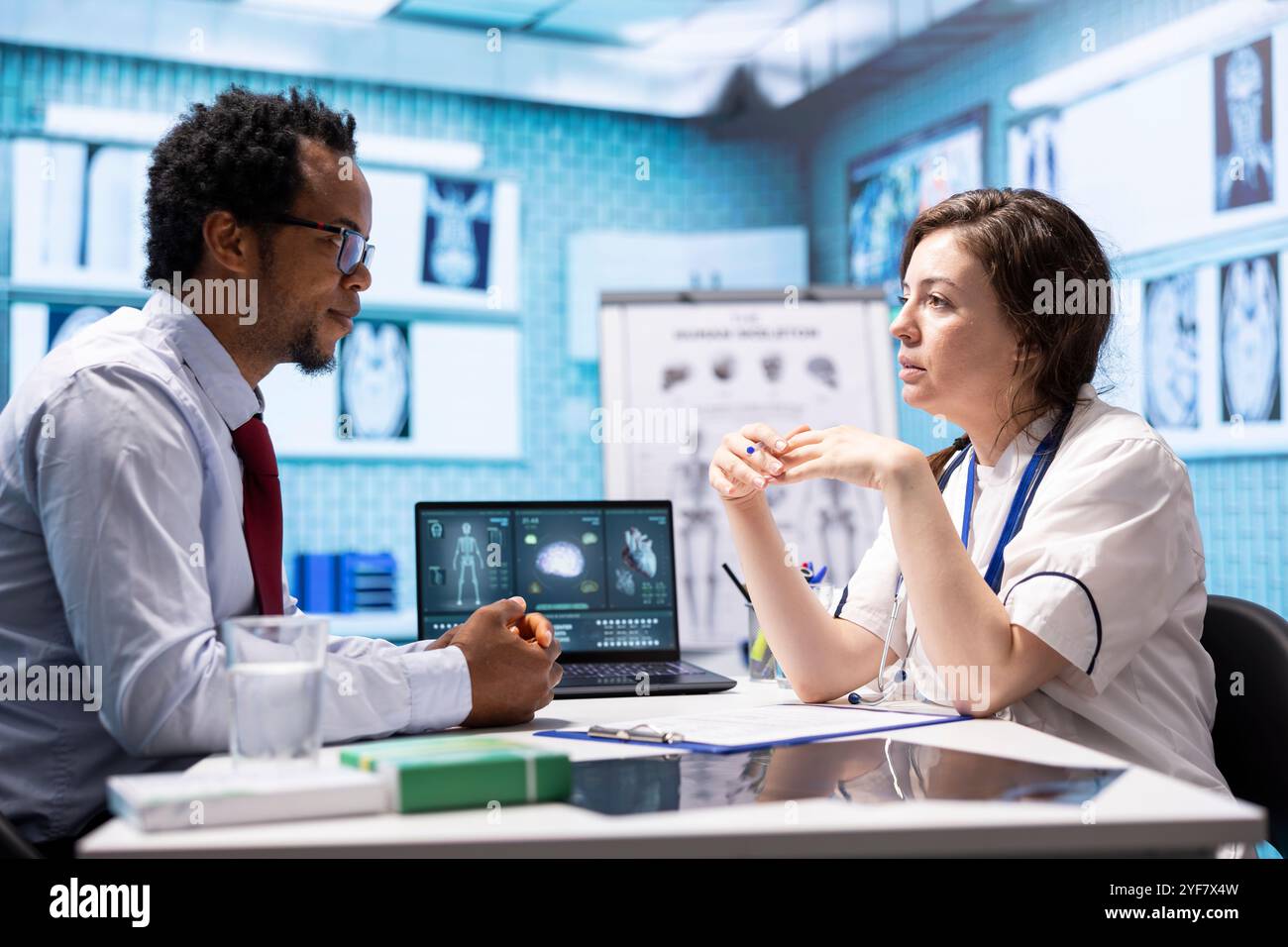 Physician presenting x ray imaging for the right diagnostic during ...