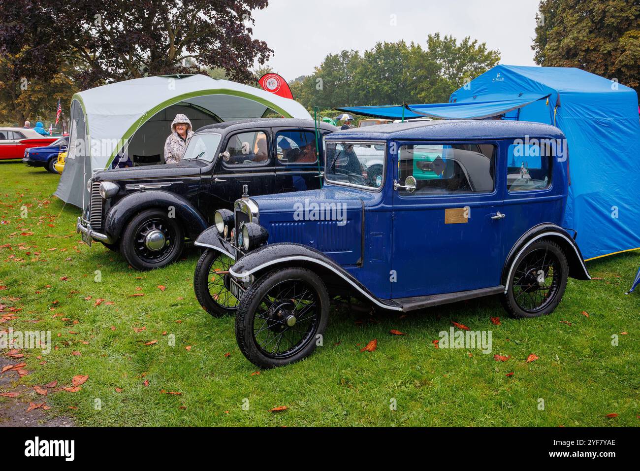 Austin 7 in front of an Austin 8 in the pouring rain at the NWCC ...
