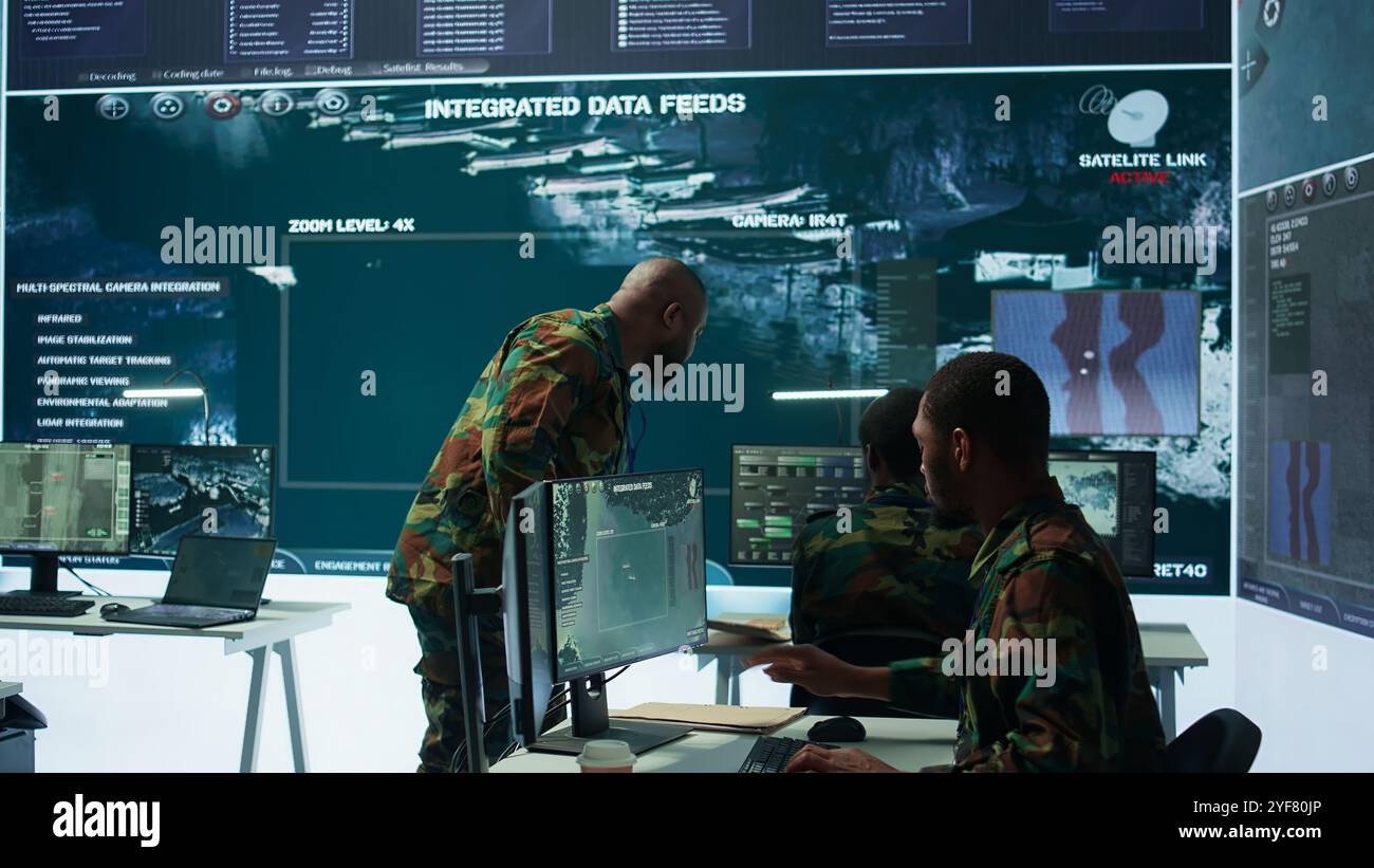 Military Staff Work In A High Tech Monitoring Room Command Post Managing Cybersecurity