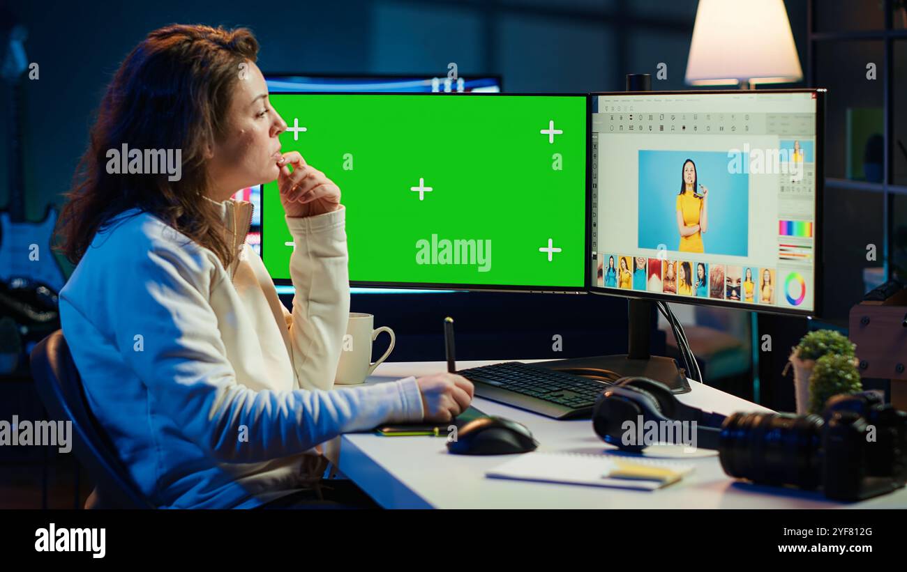 Photo Editor Using Green Screen Monitor To Look At Editorial Pictures Taken With Professional