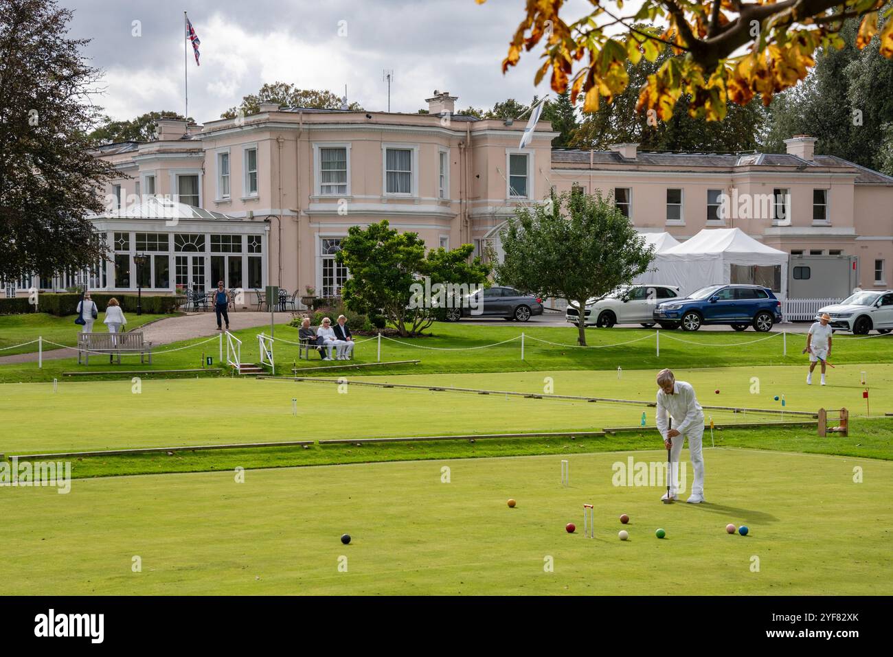 Playing croquet at Phyllis Court Club, Henley on Thames, UK Stock Photo ...