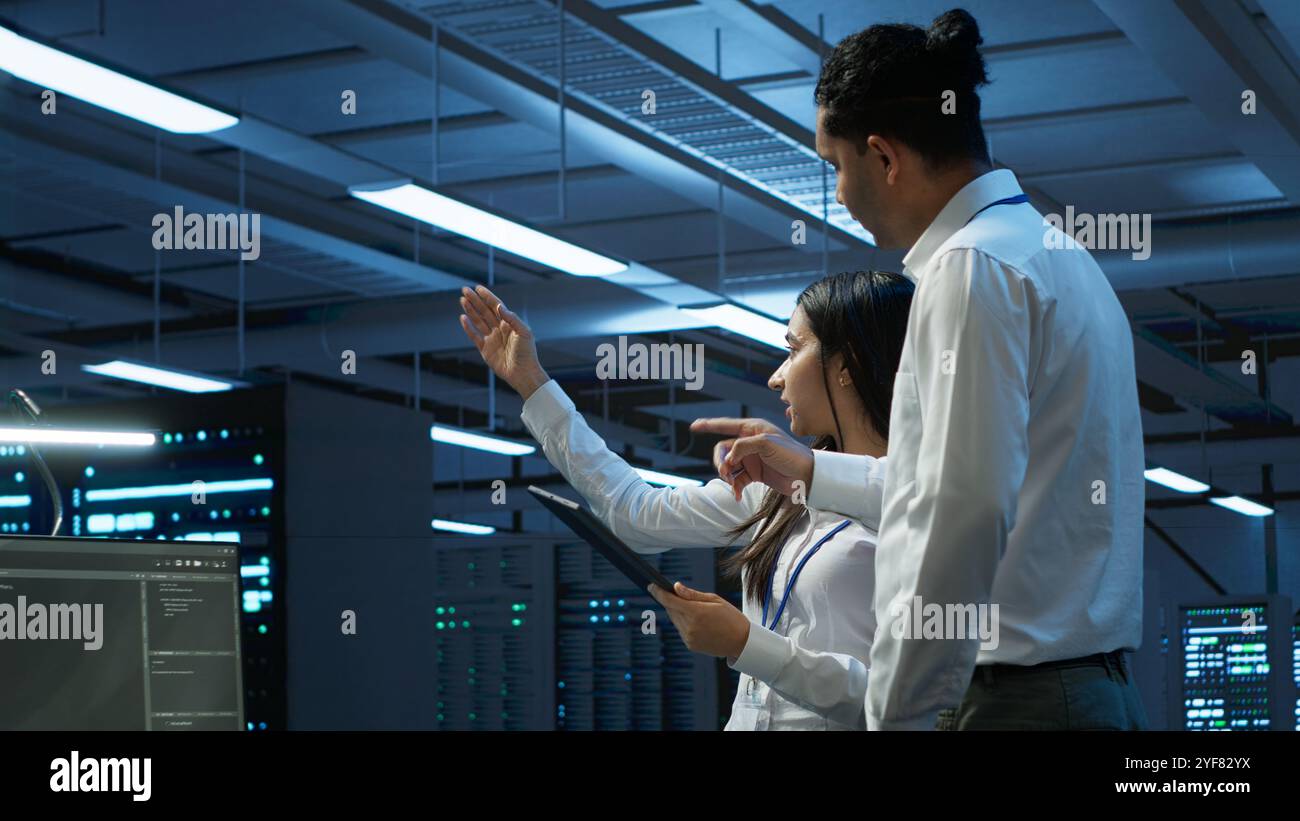 Admins In Data Center Managing And Maintaining Databases Using Device 9444