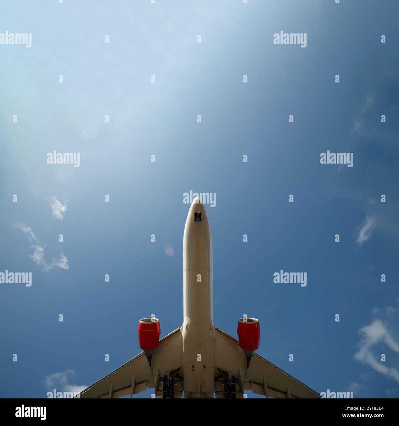 Landing passenger jet airplane planform view at daytime Stock Photo - Alamy