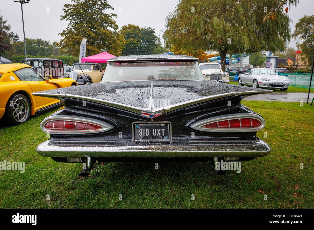 Black Chevrolet Impala car on display at a classic car show in ...