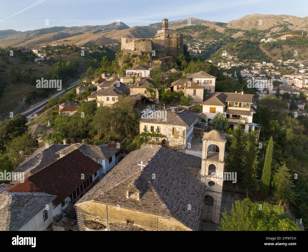Gjirokaster castle with Clock tower, ottoman architecture houses in ...