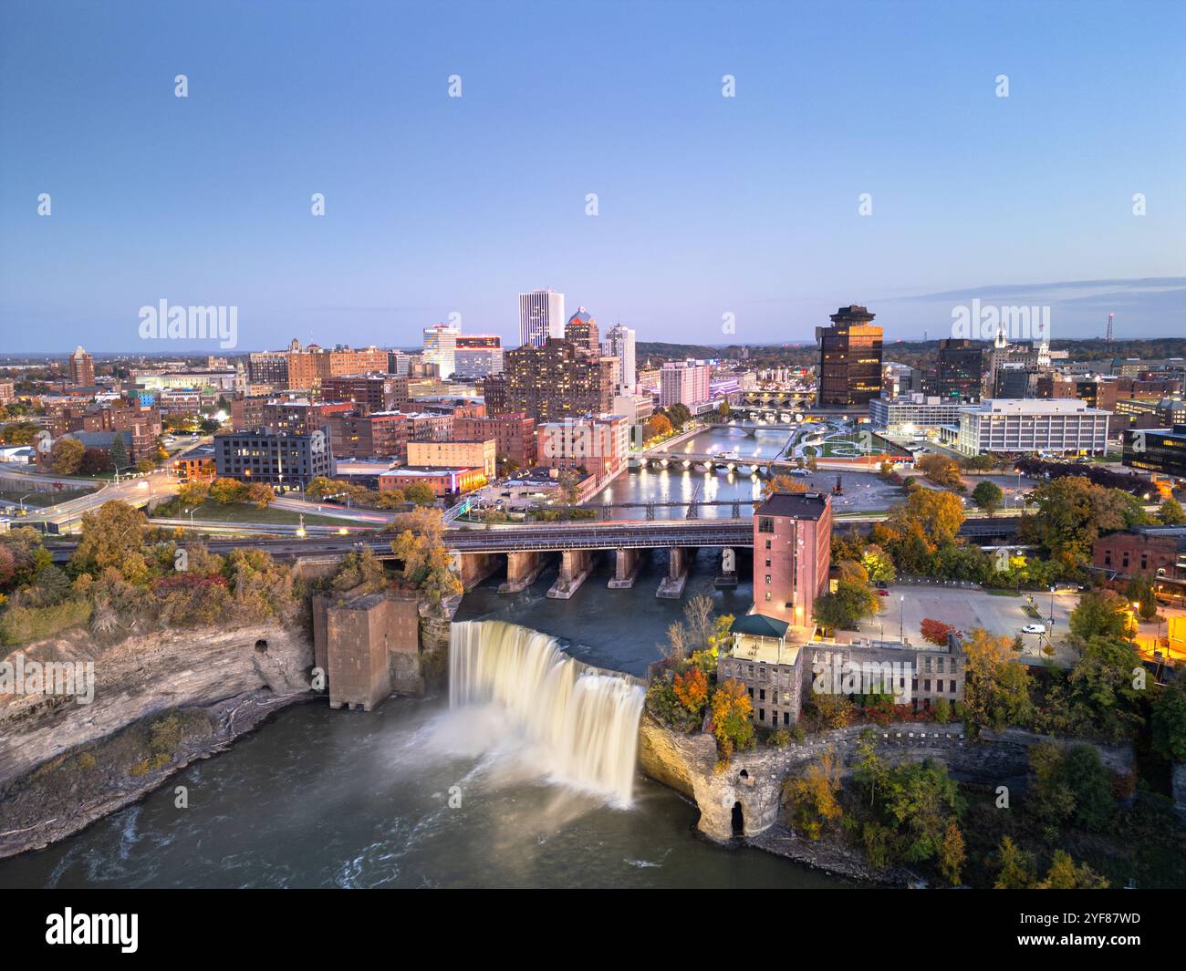 Rochester, New York, USA cityscape on the Genesee River and High Falls at twilight Stock Photo ...