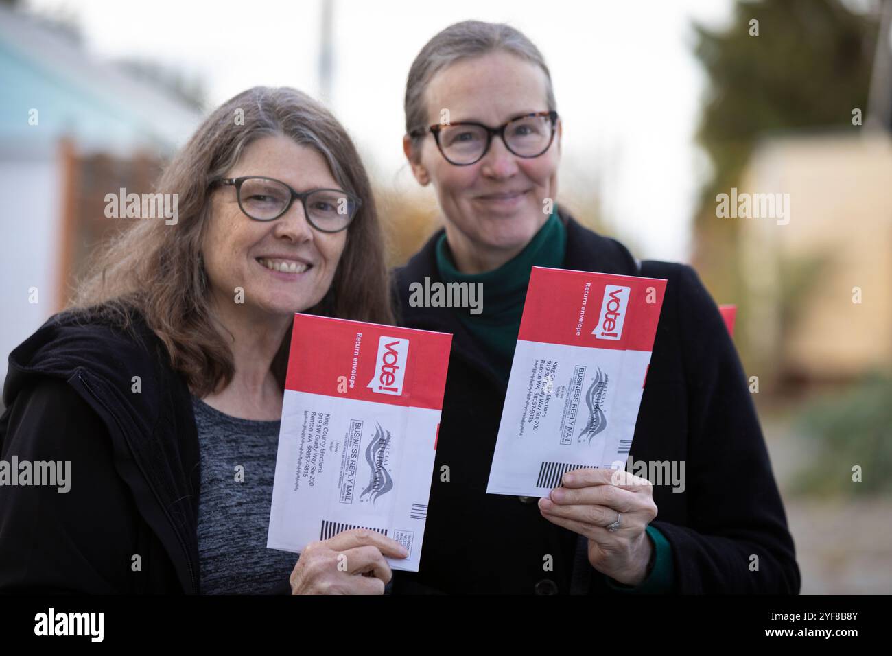 Seattle, Washington, USA. 3rd November, 2024. Voters pose with their ...