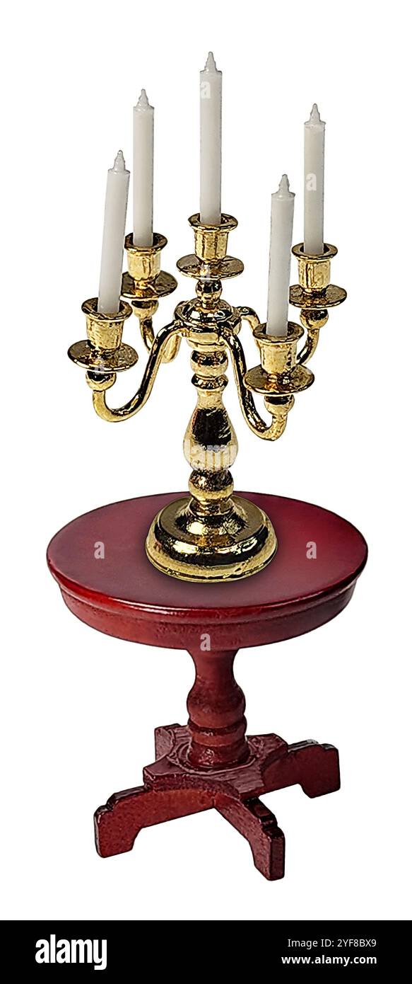Red wooden table to hold items off the floor with candelabra Stock ...