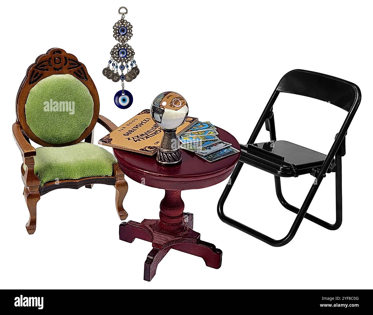 Tarot reading with cards and crystal ball with two chairs to show ...