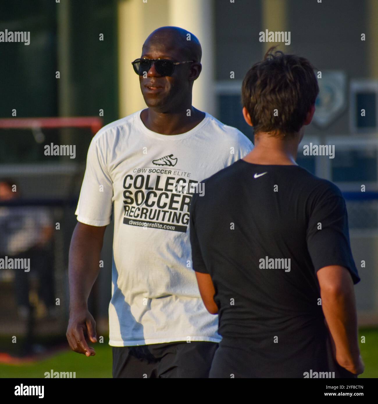 Premier League legend Chris Bart-Williams coaches a young athlete to ...