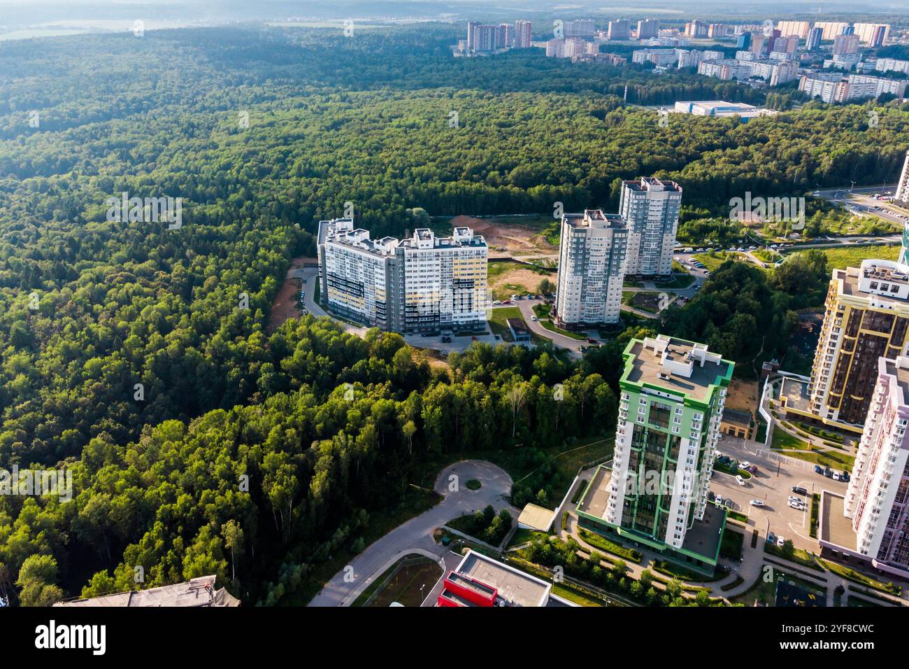 Urban expansion through forest, aerial view of residential areas Stock ...