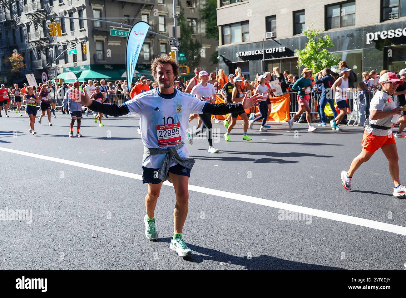 Runners trudge up First Avenue at Mile 16 of the 2024 New York City ...